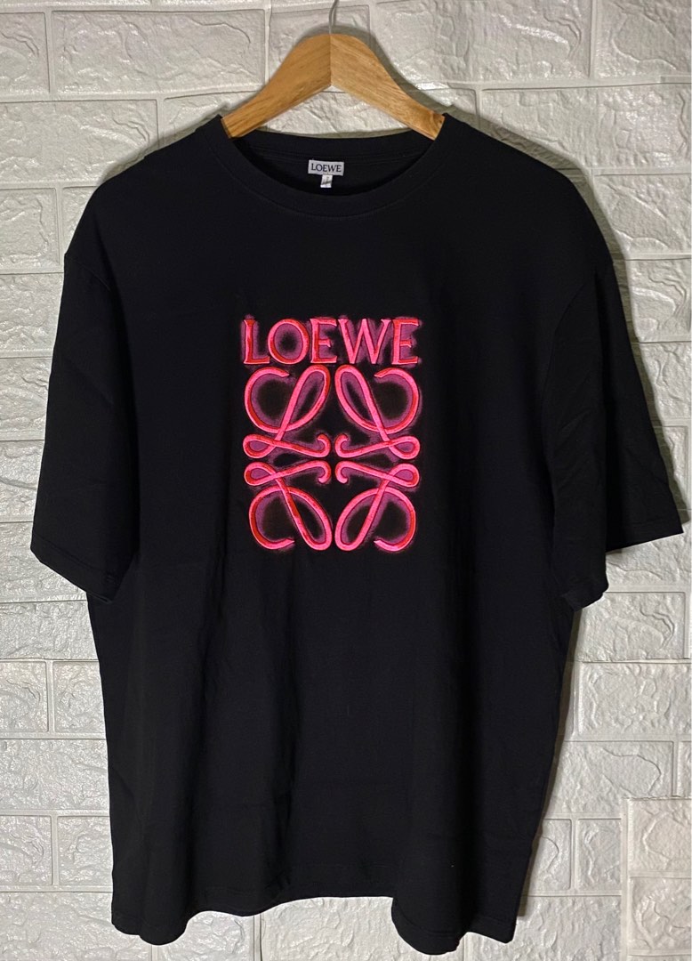 Loewe neon pink logo on Carousell
