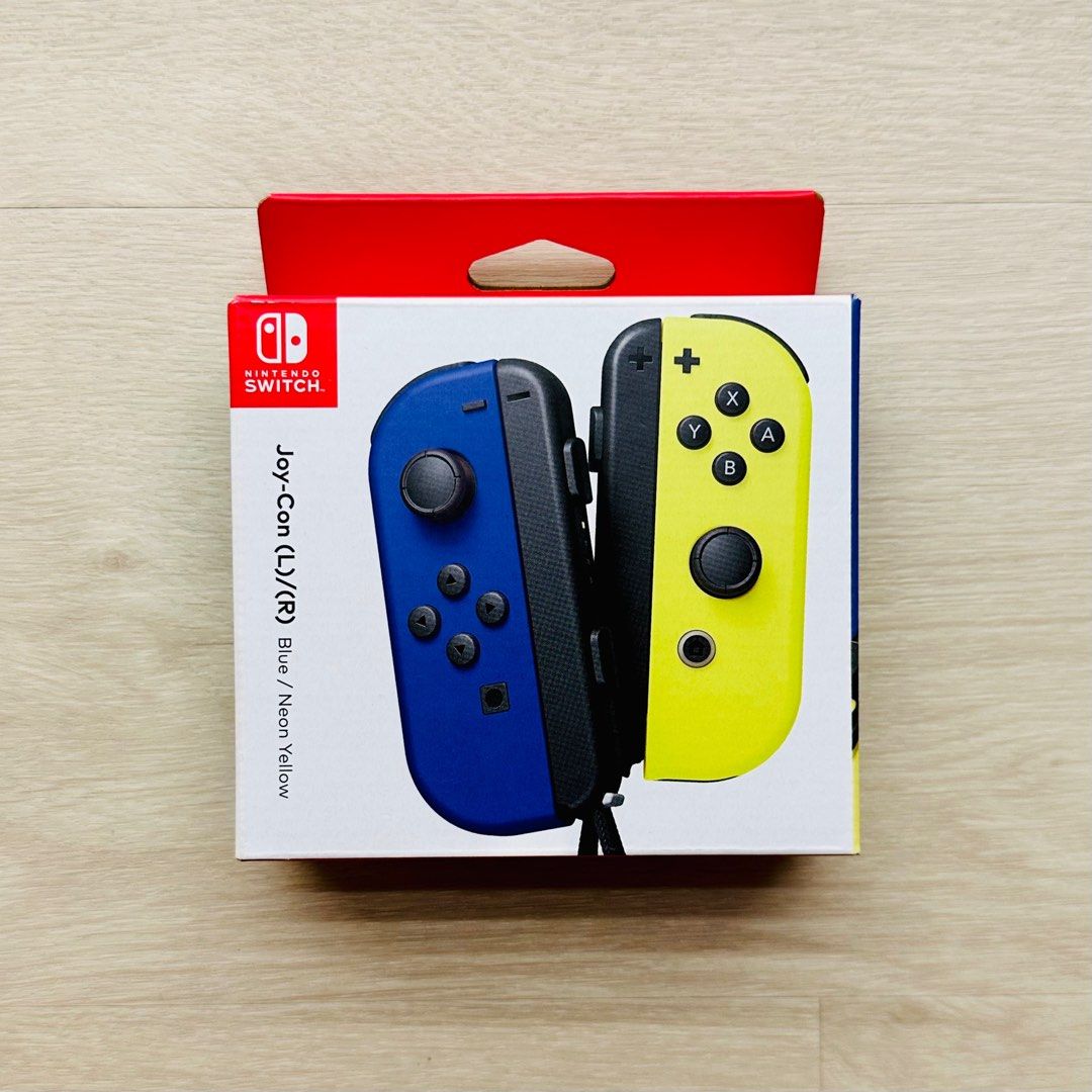 Nintendo Switch Joycon Blue/Yellow, Video Gaming, Video Game Consoles ...