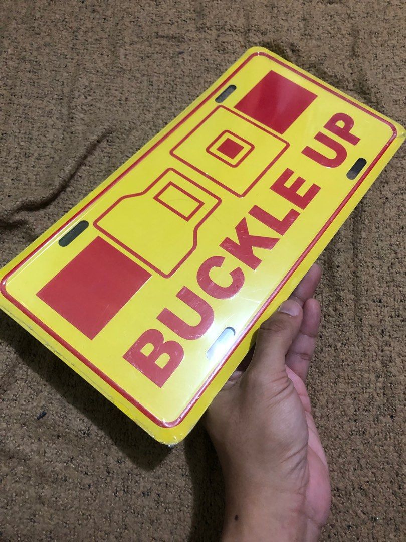 Buckle up tin car plate on Carousell