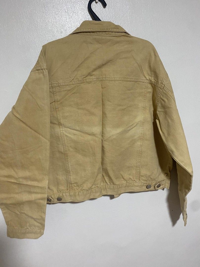 Tan colored denim jacket on Carousell