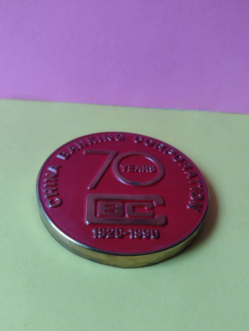 Vintage China Bank 70th Anniversary Paperweight ( metal ) on Carousell