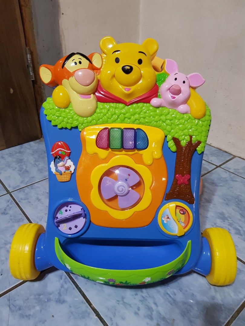 WINNIE THE POOH PUSH WALKER on Carousell