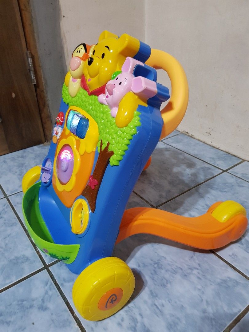 WINNIE THE POOH PUSH WALKER on Carousell