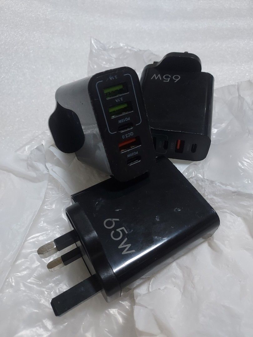 65W fast charger UK Plug. One PD20W port, one PD15W port, three USB ...