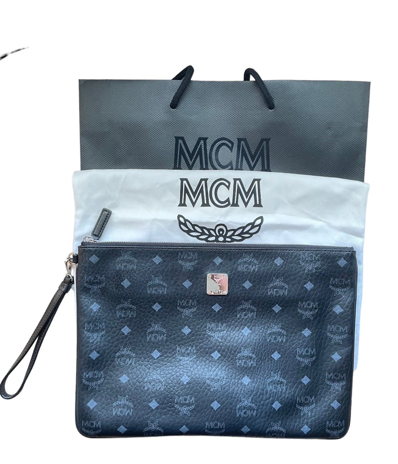 MCM clutch bag, Luxury, Bags & Wallets on Carousell