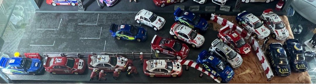 1/64 lot of 21 CMS rally cars - Mitsubishi, Subaru & Peugeot, Hobbies ...