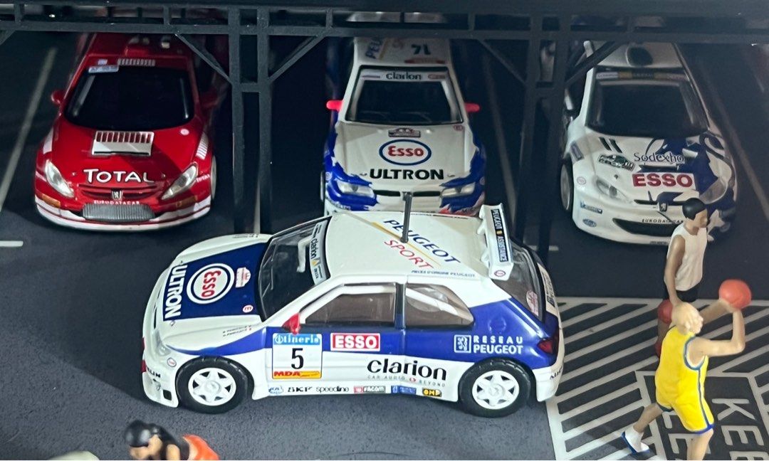 1/64 lot of 21 CMS rally cars - Mitsubishi, Subaru & Peugeot, Hobbies ...