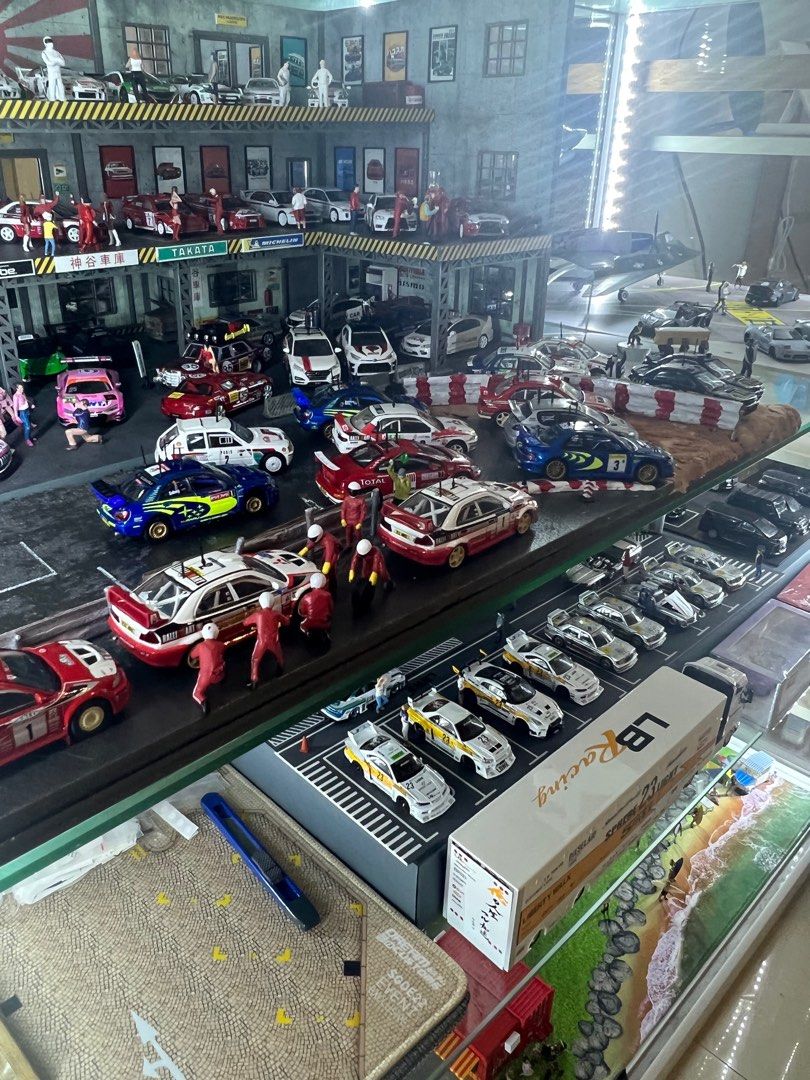 1/64 lot of 21 CMS rally cars - Mitsubishi, Subaru & Peugeot, Hobbies ...