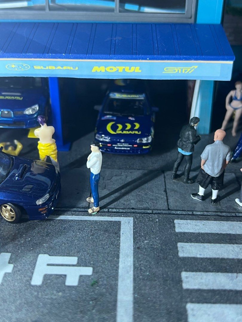 1/64 lot of 21 CMS rally cars - Mitsubishi, Subaru & Peugeot, Hobbies ...