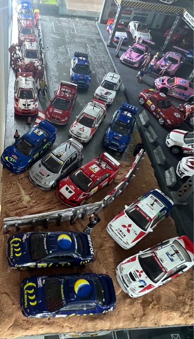 1/64 lot of 21 CMS rally cars - Mitsubishi, Subaru & Peugeot, Hobbies ...