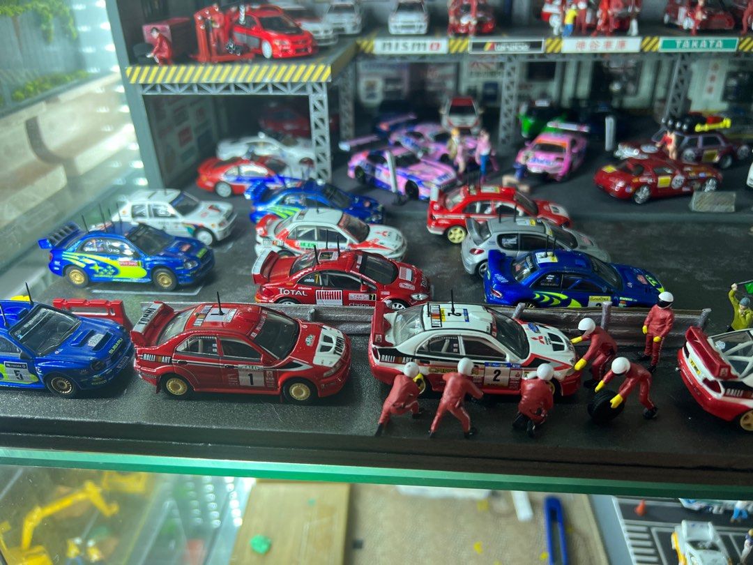 1/64 lot of 21 CMS rally cars - Mitsubishi, Subaru & Peugeot, Hobbies ...