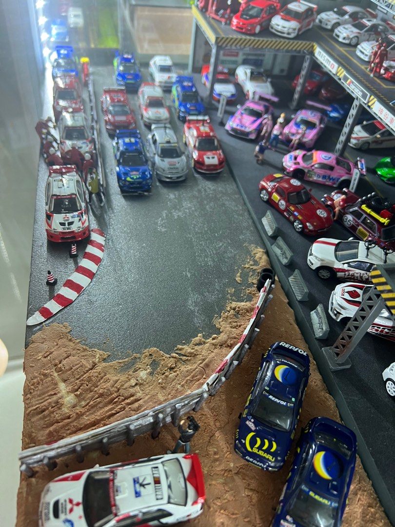 1/64 lot of 21 CMS rally cars - Mitsubishi, Subaru & Peugeot, Hobbies ...