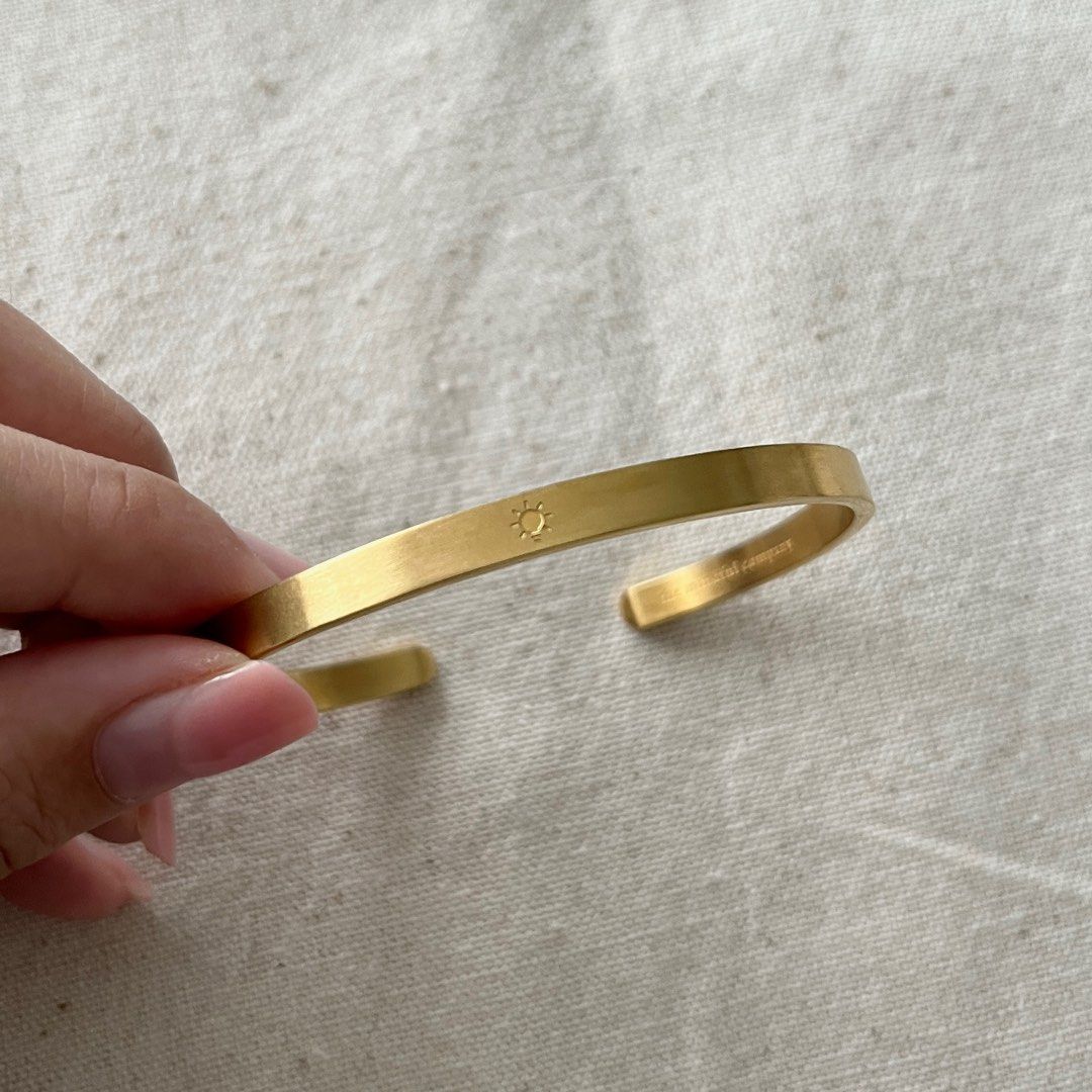 The Mindful Company Light Bulb Reminder Cuff in Matte Gold, Women's ...