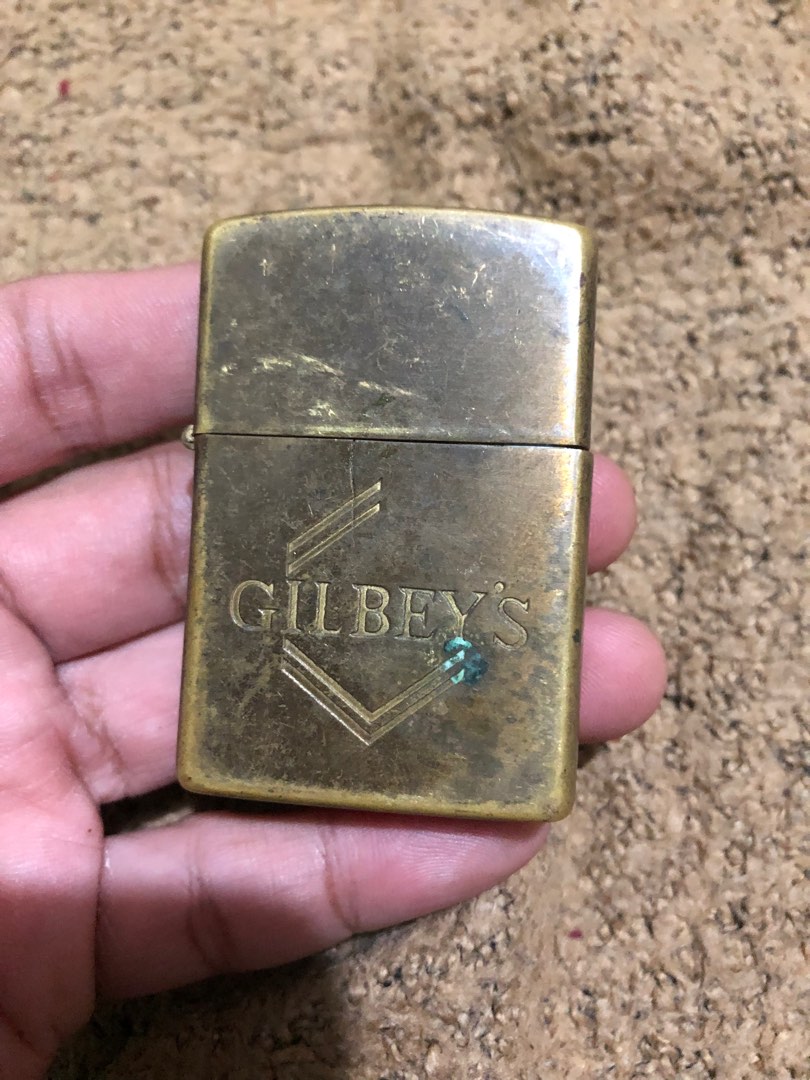 Vintage gilbeys gin promotional lighter on Carousell