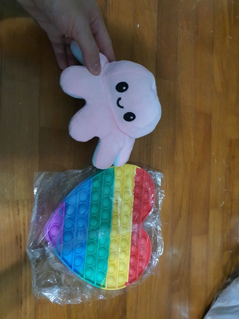 Fidget pop + octopus emoji, Hobbies & Toys, Toys & Games on Carousell