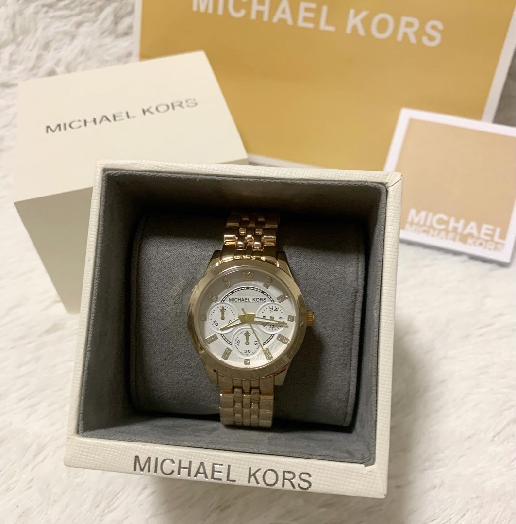 Michael Kors Medium watch with studs on Carousell