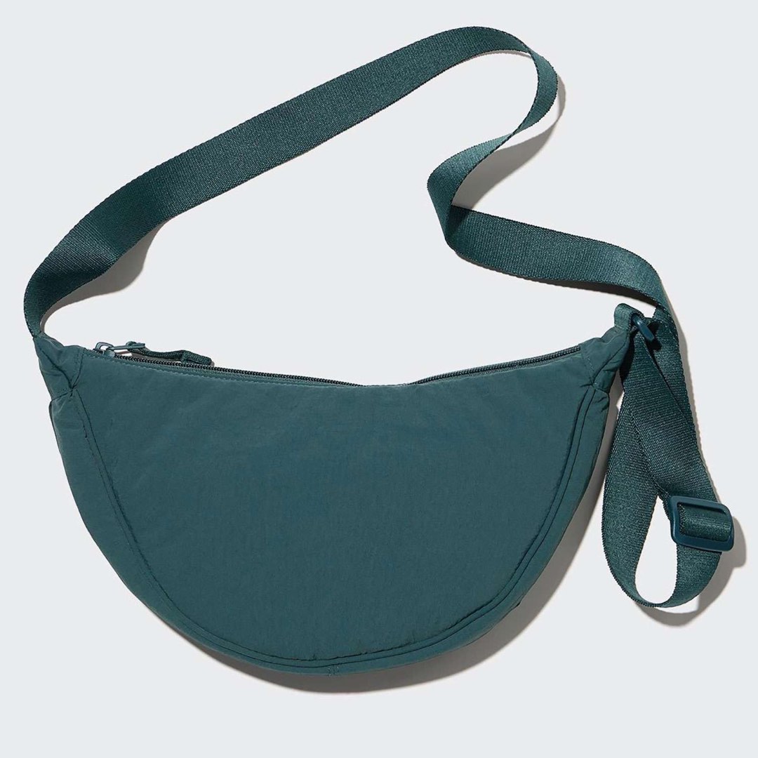 uniqlo moon sling bag in teal, Men's Fashion, Bags, Sling Bags on Carousell
