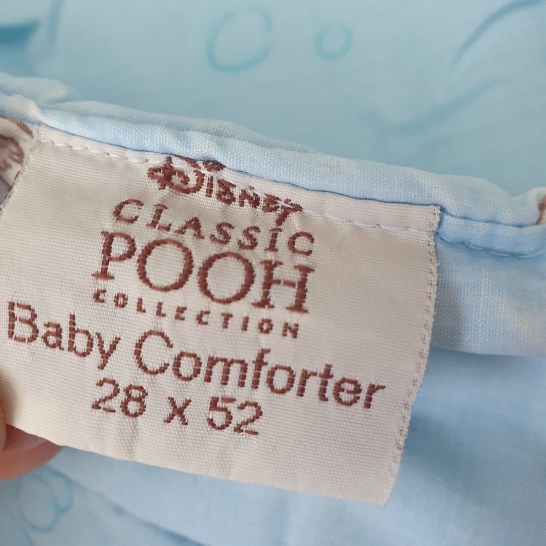 Blue winnie the pooh crib comforter on Carousell