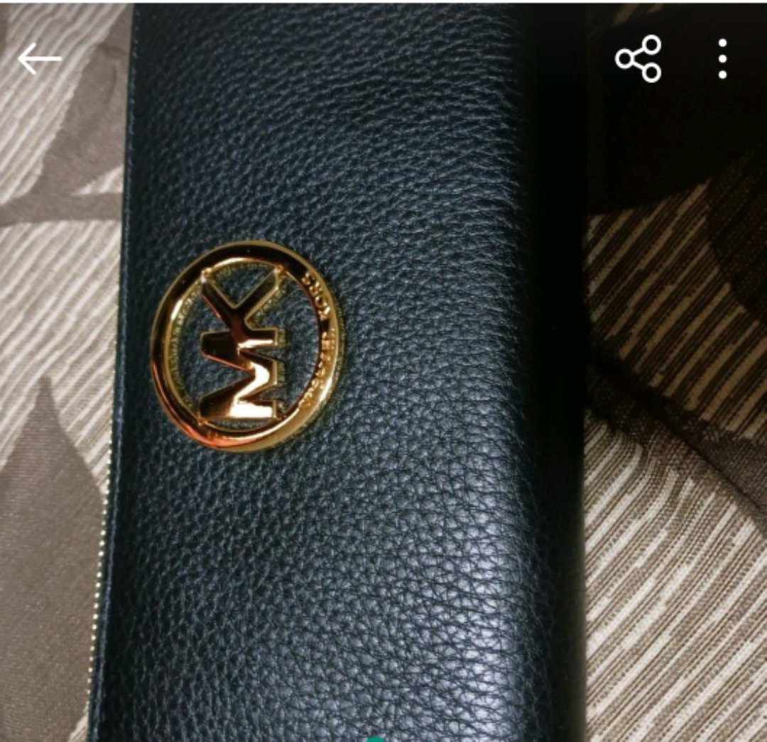 Authentic MK Long wallet on Carousell