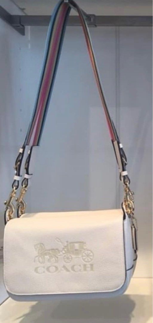 Coach Messenger Bag (white with colorful strap) on Carousell