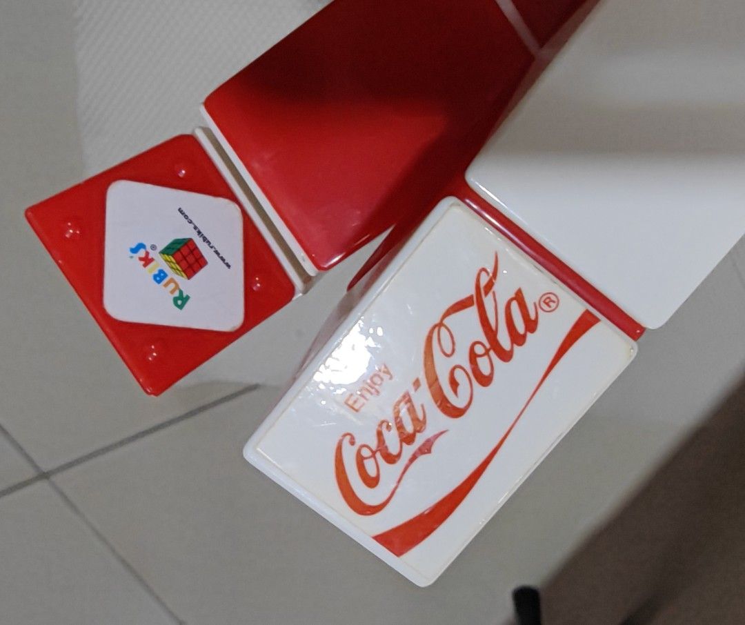 coca cola rubicks snake cube on Carousell