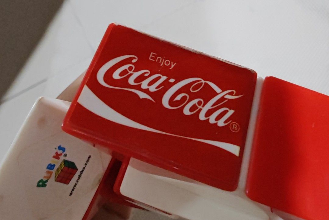 coca cola rubicks snake cube on Carousell