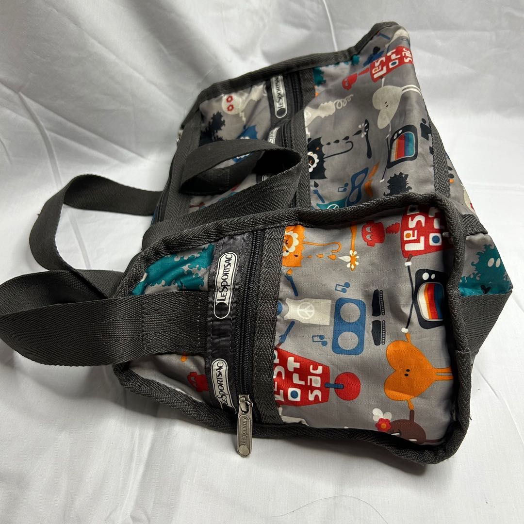 TAS LESPORTSAC ABU-ABU AUTHENTIC, Fesyen Wanita, Tas & Dompet di Carousell