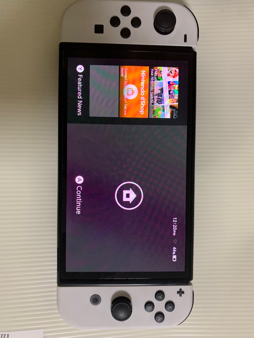 white nintendo switch oled with game and casing, Video Gaming, Video ...