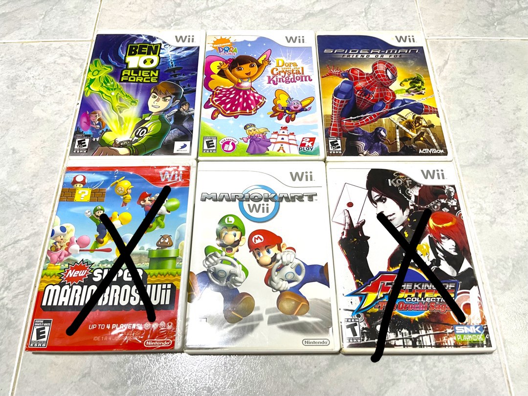 Wii games (Ben 10 , Dora the explorer, Spider-Man , super Mario Bros , Mario kart , the king of ...
