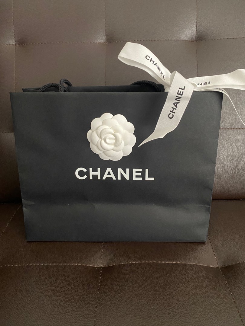 Chanel paper bag, Luxury, Bags & Wallets on Carousell