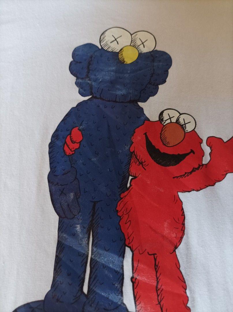 Elmo x kaws tee on Carousell