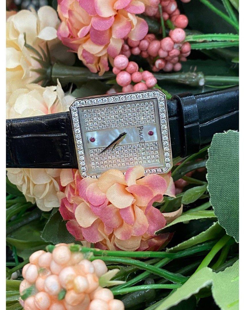 PIAGET 750 WHITE GOLD MOTHER OF PEARL DIAL WITH DIAMONDS AND RUBIES ...