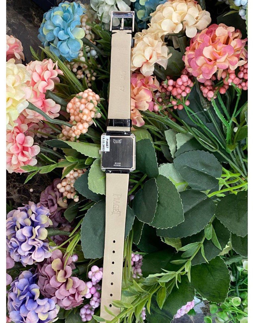 PIAGET 750 WHITE GOLD MOTHER OF PEARL DIAL WITH DIAMONDS AND RUBIES ...