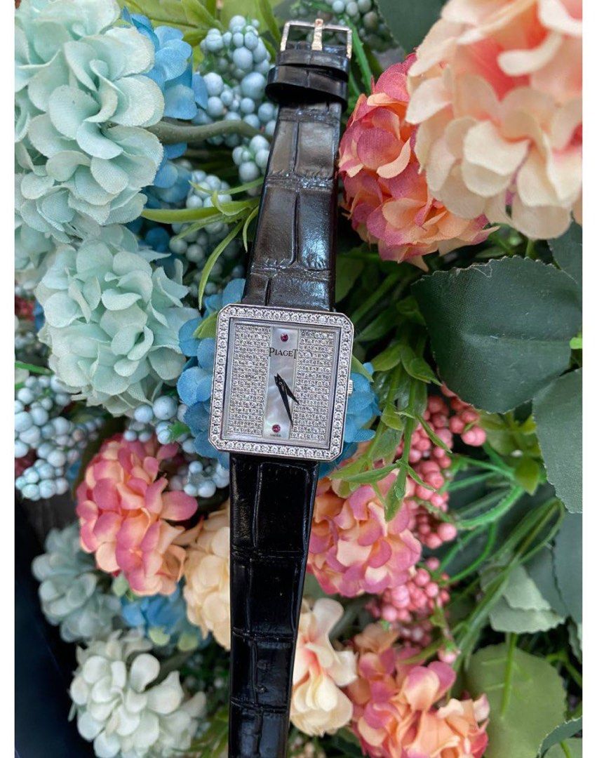 PIAGET 750 WHITE GOLD MOTHER OF PEARL DIAL WITH DIAMONDS AND RUBIES ...