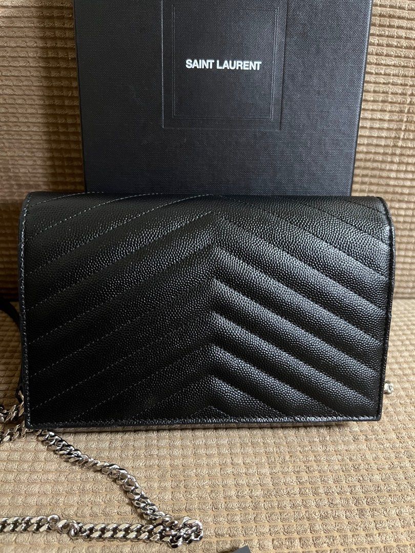 YSL Woc in Monogram Grain leather and silver hardware on Carousell