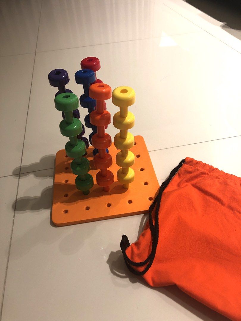 Pegboard with oversized pegs, Babies & Kids, Infant Playtime on Carousell
