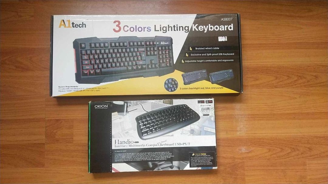 A1 tech and Okion keyboards with boxes on Carousell