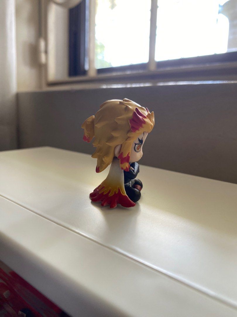 Rengoku demon slayer gachapon sitting figure (authentic), Hobbies ...