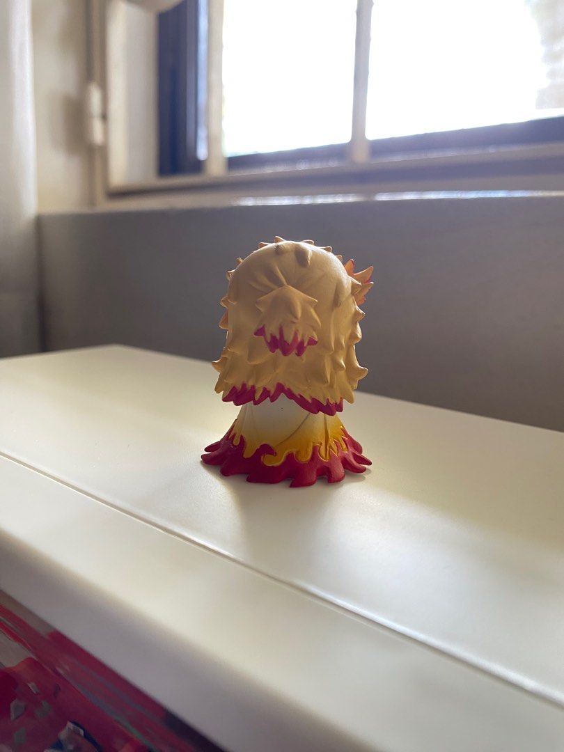 Rengoku demon slayer gachapon sitting figure (authentic), Hobbies ...