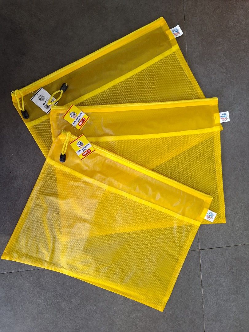 Yellow long plastic mesh envelope on Carousell