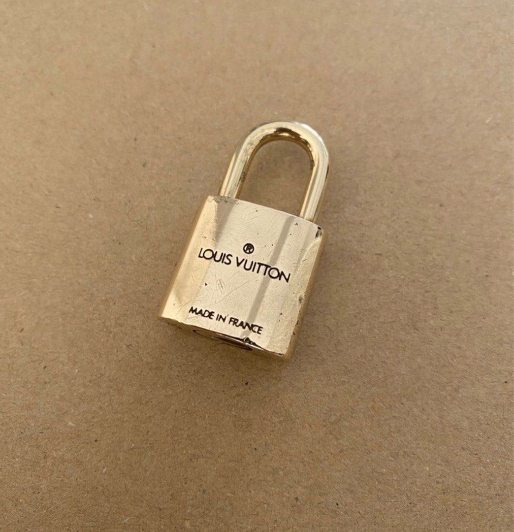 Louis Vuitton lock LV , Luxury, Accessories on Carousell