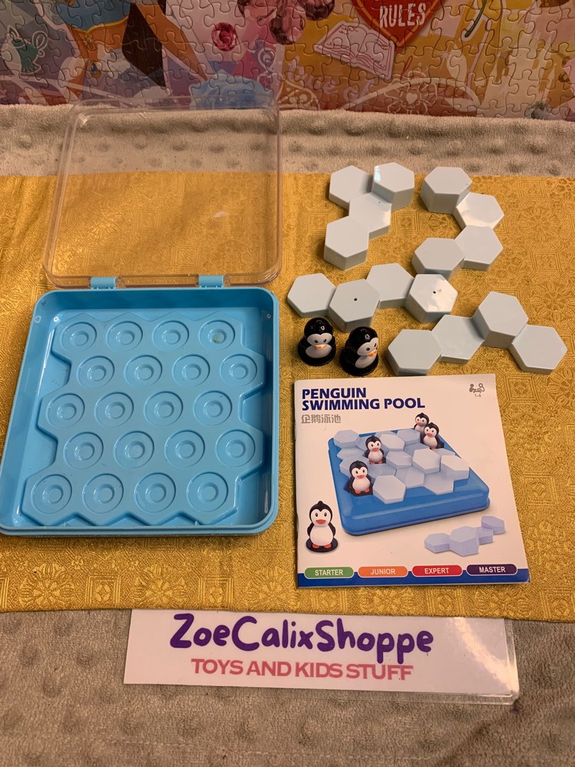 Penguin swimming pool board game on Carousell