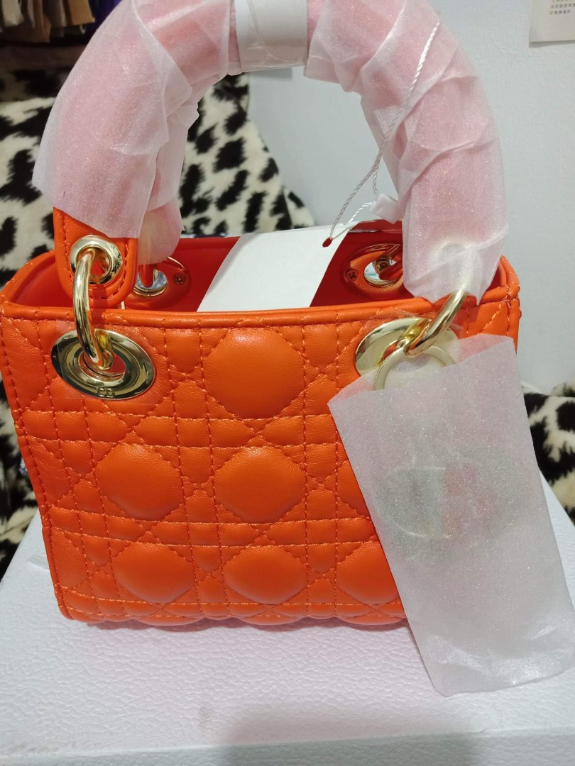 cd orange bag, Luxury, Bags & Wallets on Carousell