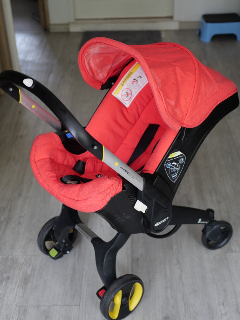 Doona Infant Carseat Stroller (light red), Babies & Kids, Going Out ...