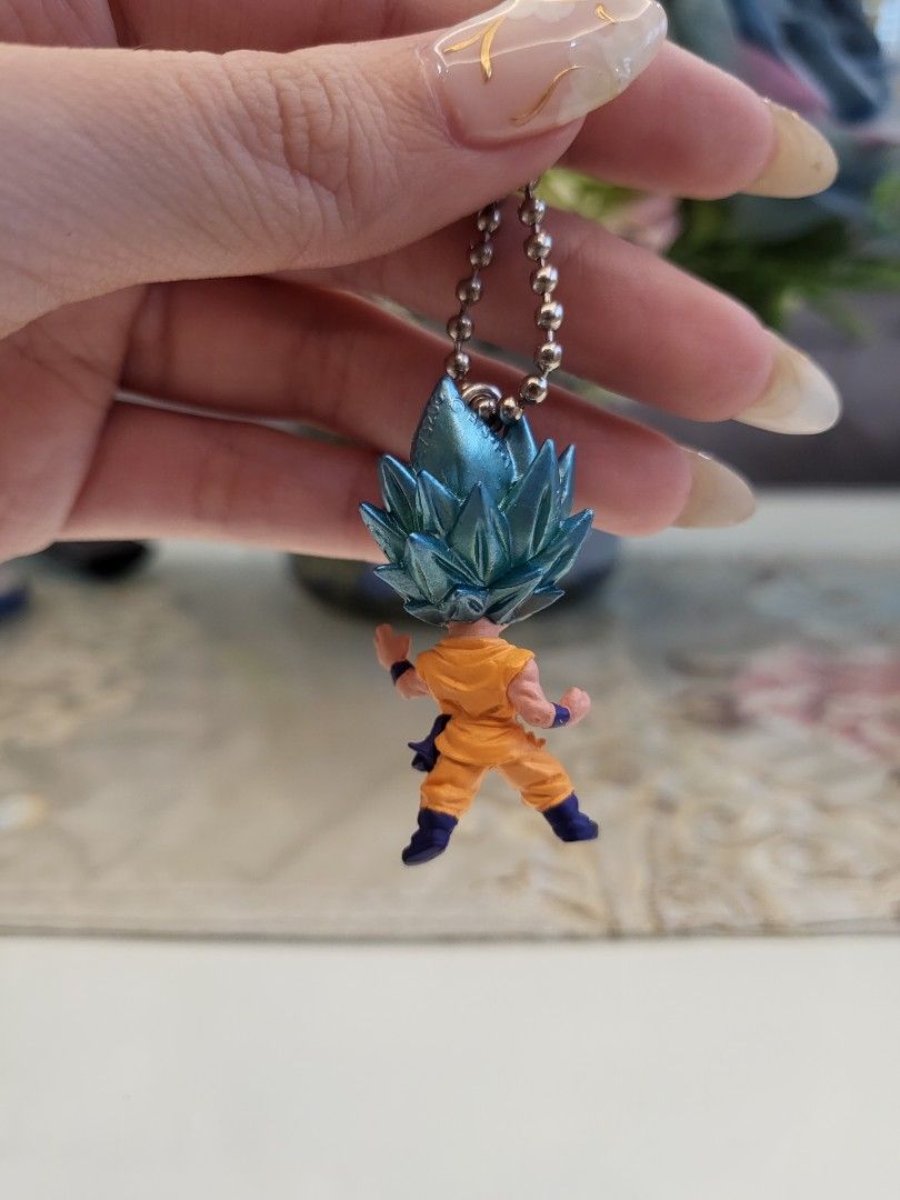 Super Saiyan God Goku Keychain on Carousell