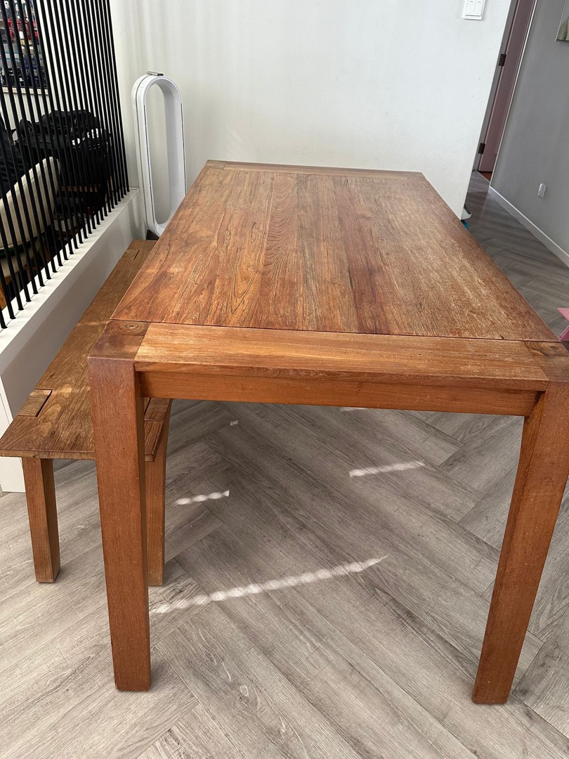 First hand owned Journey East trapezium teak wood dining table and ...