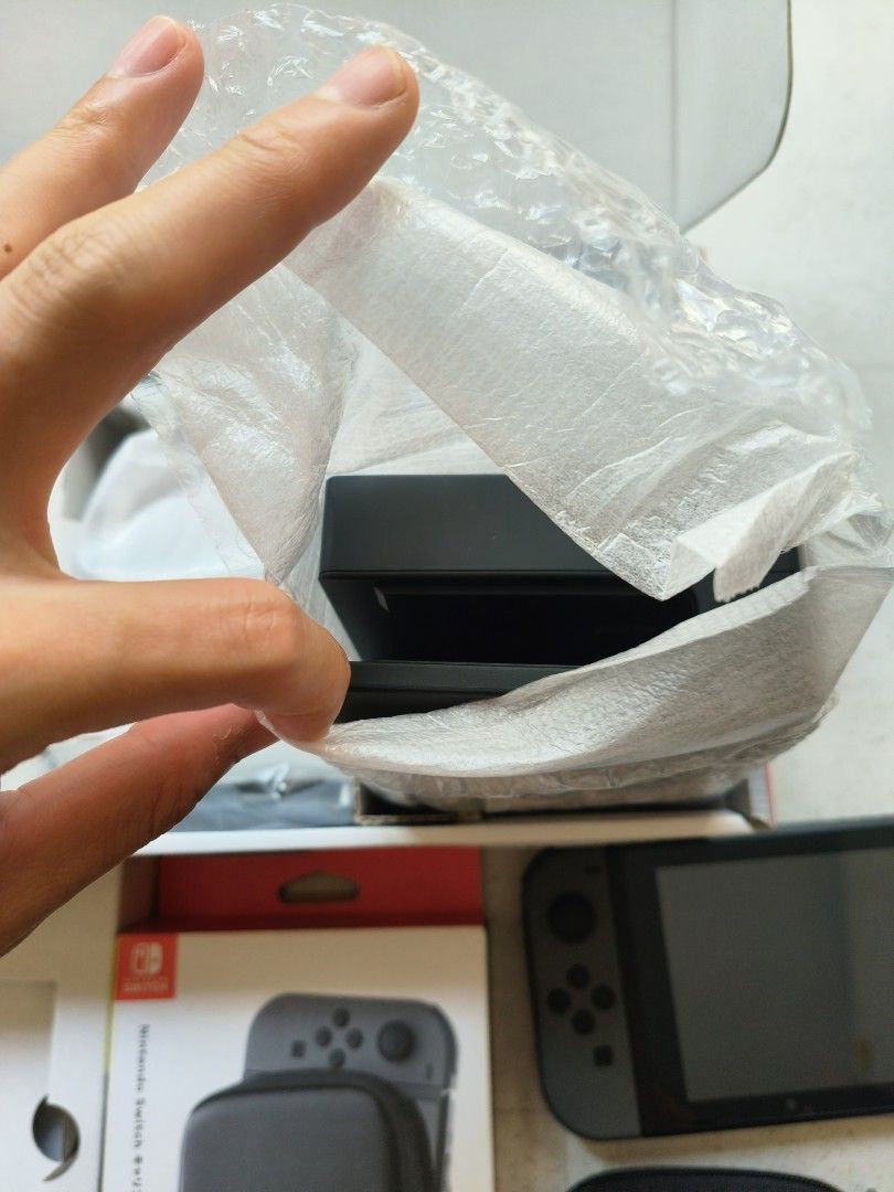 Nintendo switch with casing, Video Gaming, Video Game Consoles ...