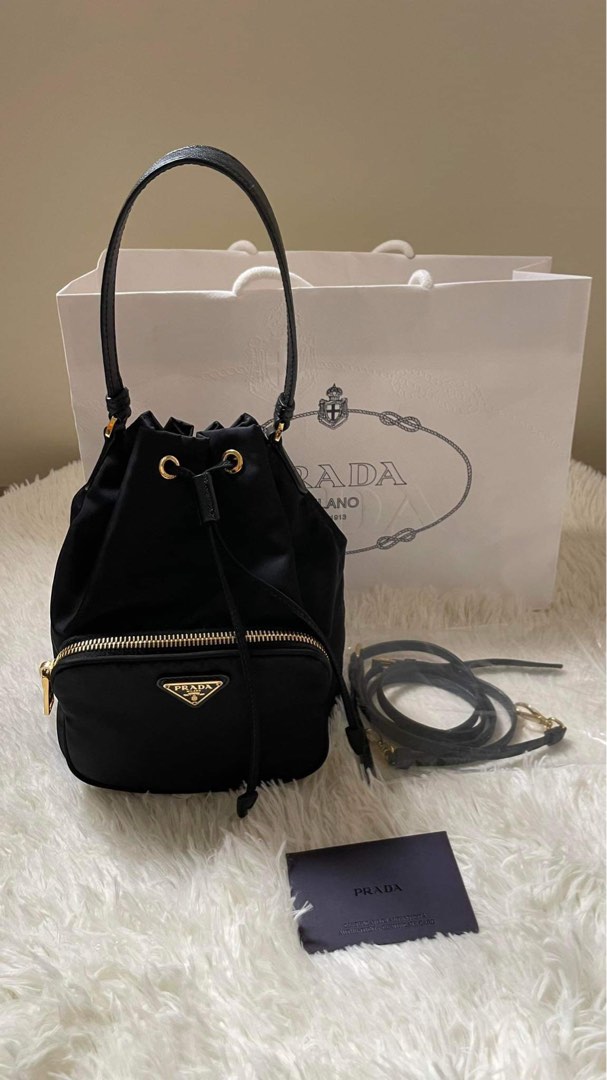 Prada bucket bag in nylon, Luxury, Bags & Wallets on Carousell
