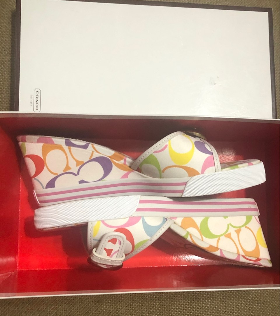 Signature Coach Perry white wedge (36) on Carousell