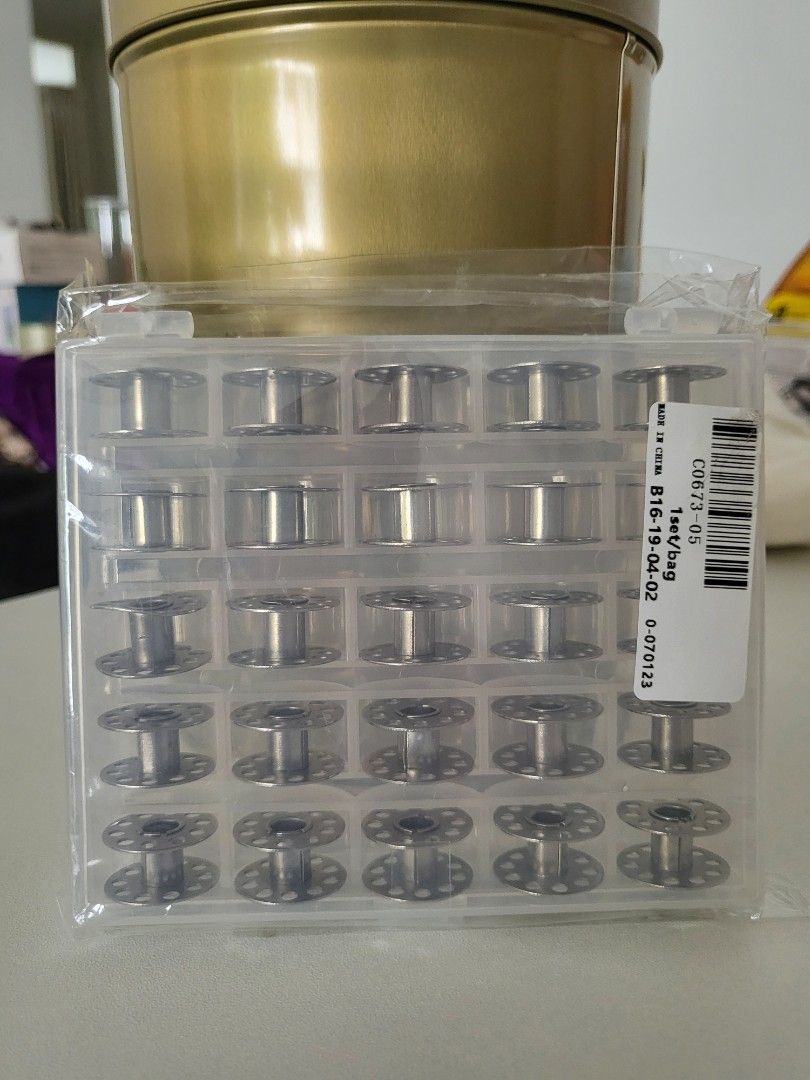 metal bobbins with storage case, Hobbies & Toys, Stationery & Craft ...